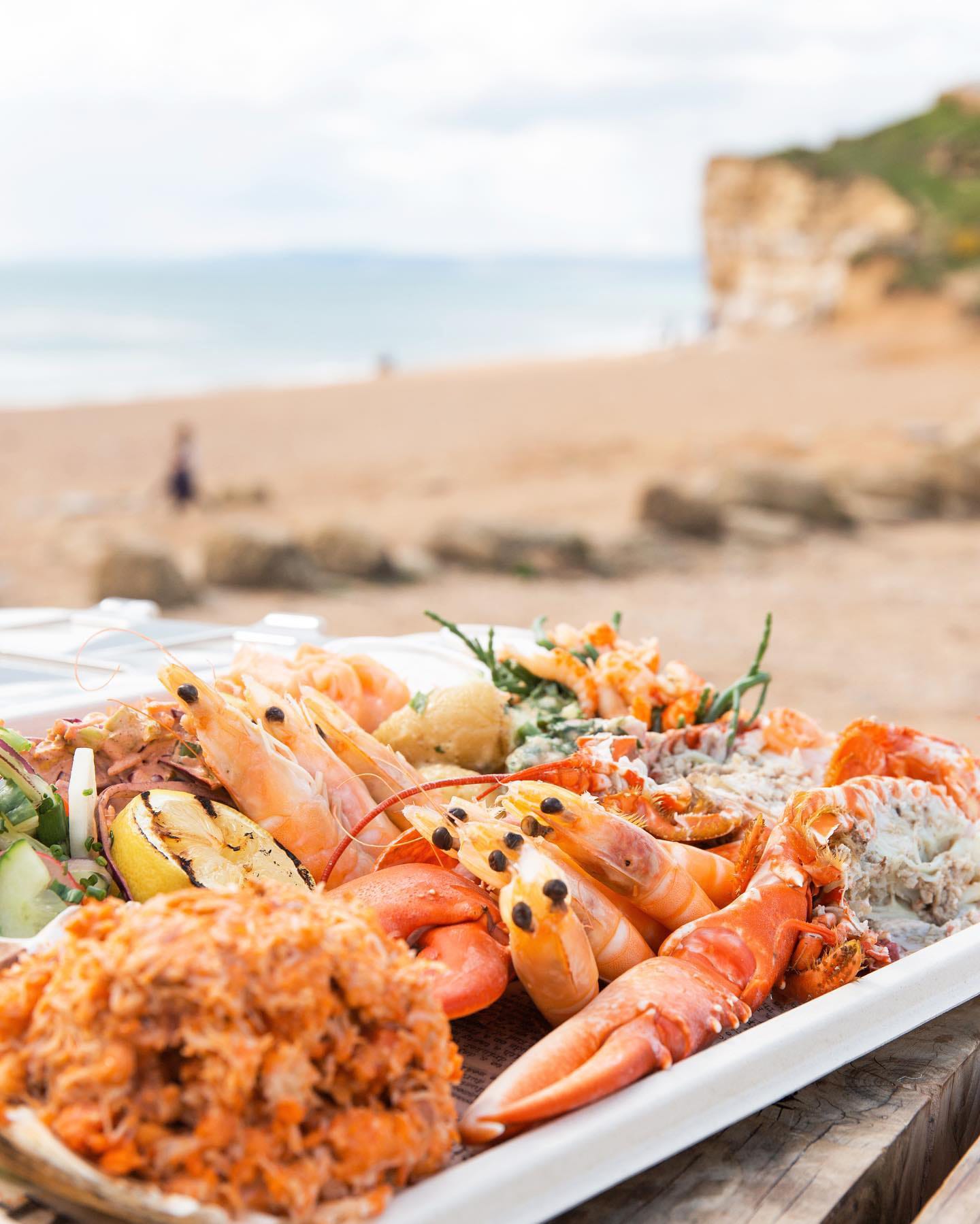 Enjoy lunch at Hive Beach Café | Luxury Family Hotels